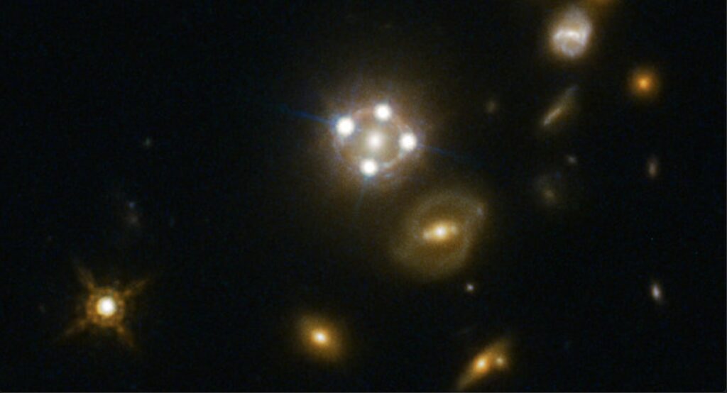 Ghostly “Einstein Crosses” Spotted in Deep Space Could Help Resolve ...